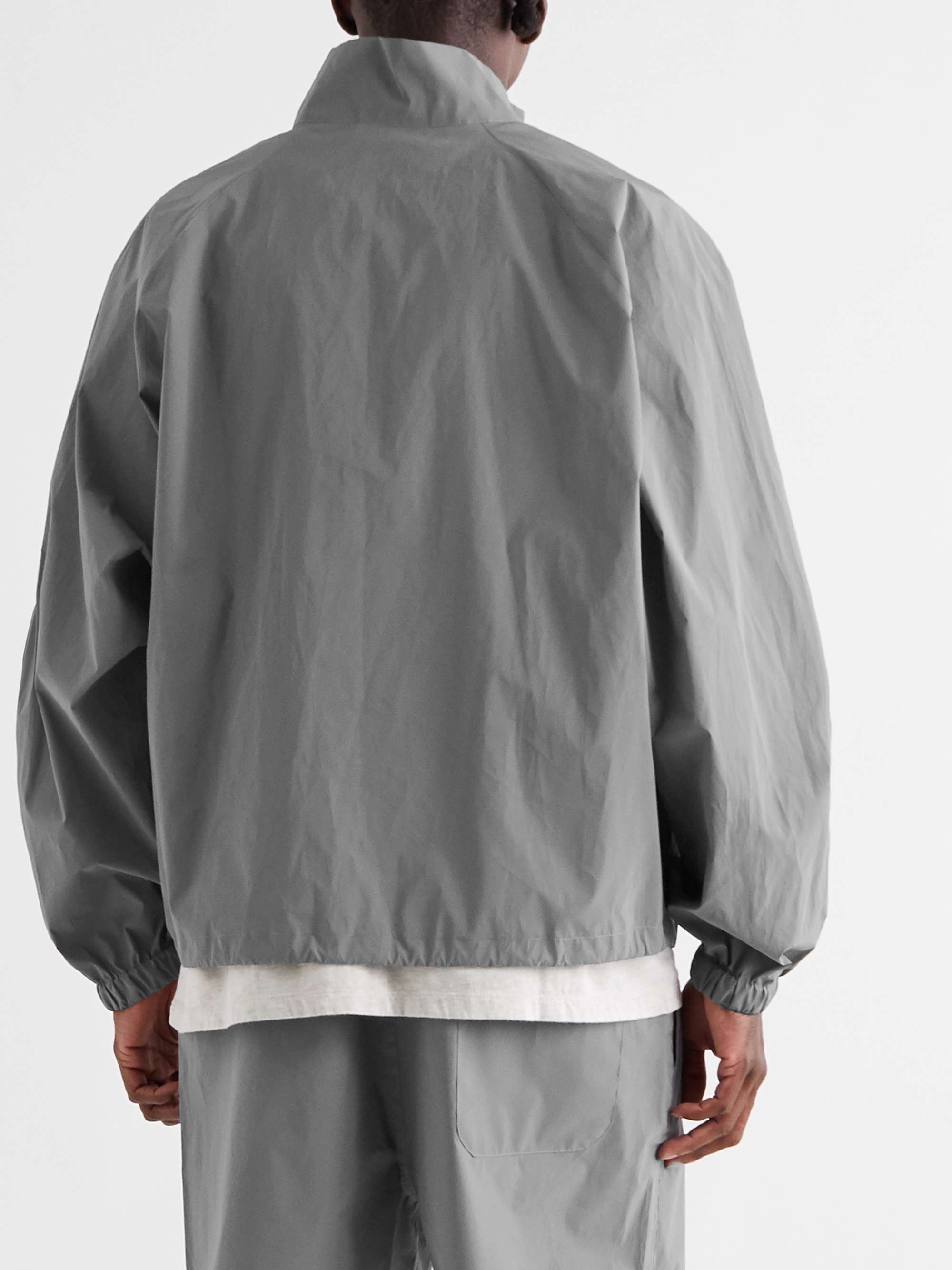 FEAR OF GOD ESSENTIALS Reflective Shell Half-Zip Track Jacket for Men ...