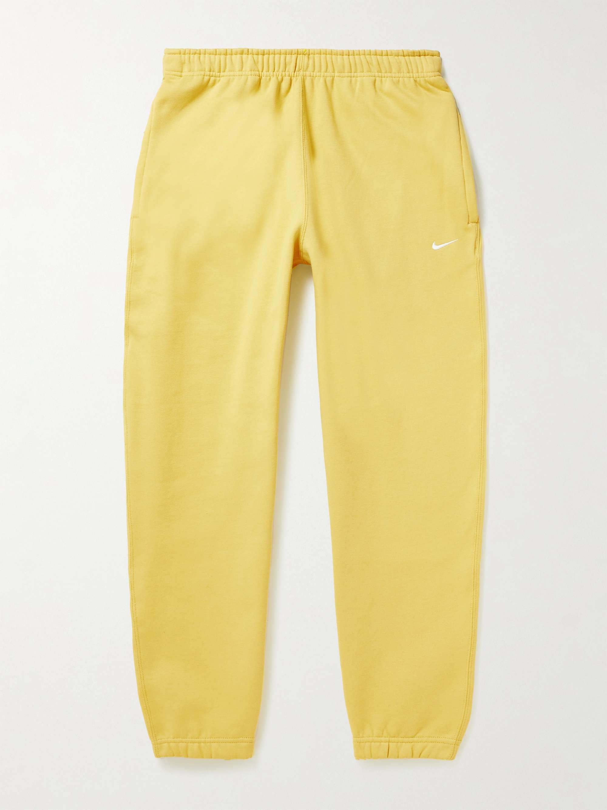 Yellow Nike Swoosh