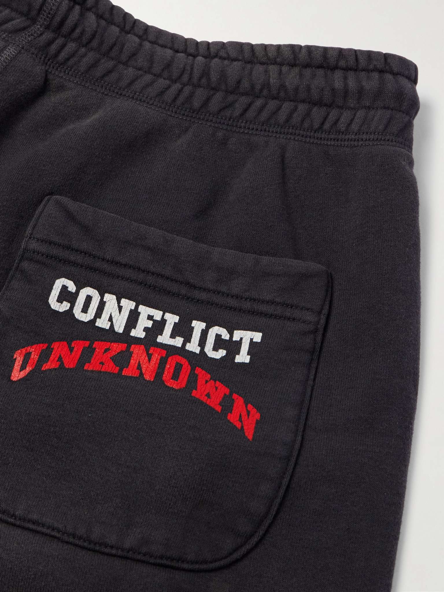 SAINT MXXXXXX + Denim Tears Tapered Distressed Printed Cotton-Jersey ...