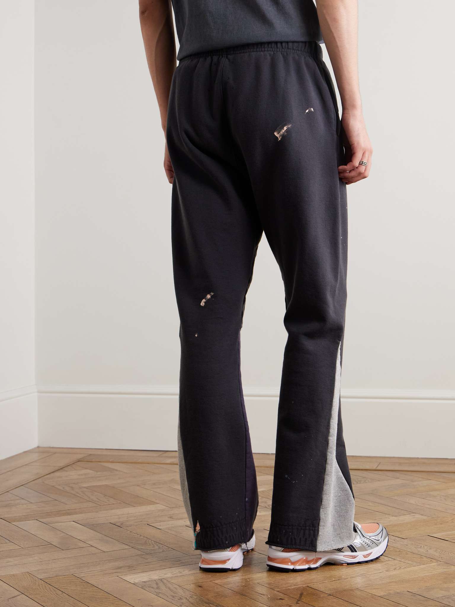 GALLERY DEPT. Flared Paint-Splattered Panelled Logo-Print Cotton-Jersey ...