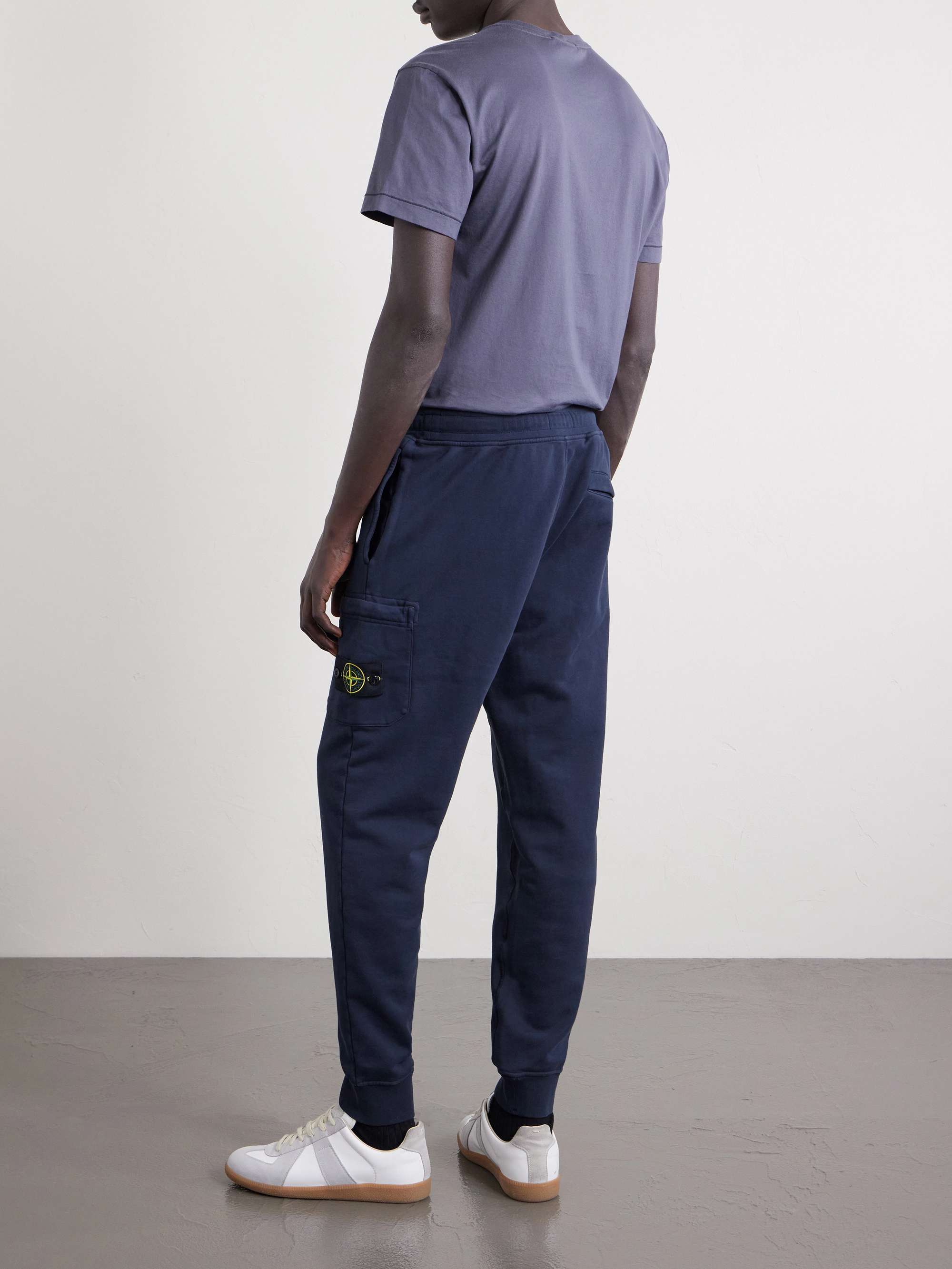 STONE ISLAND Tapered Logo-Appliquéd Organic Cotton-Jersey Sweatpants ...